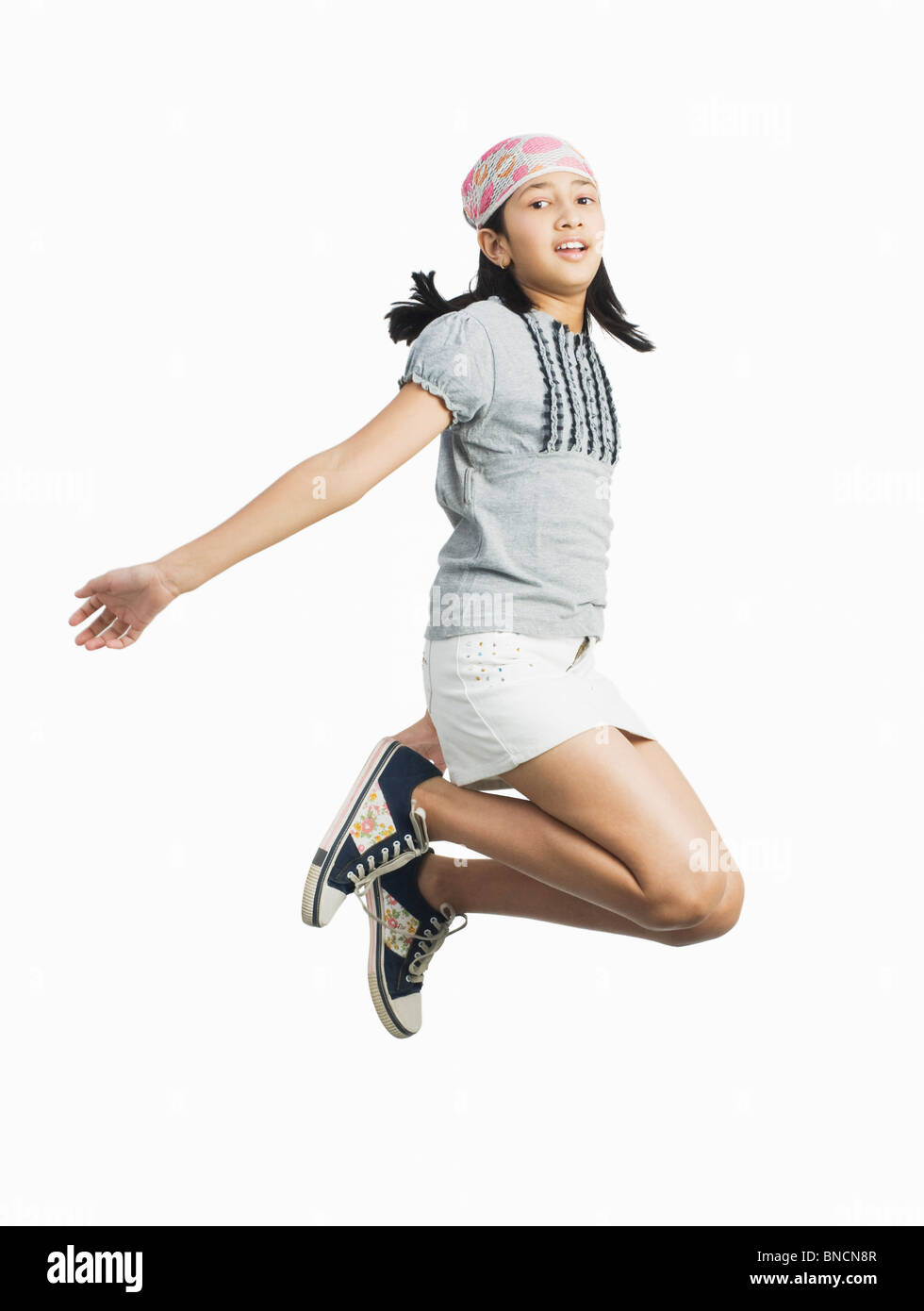 Portrait of a girl jumping Stock Photo - Alamy