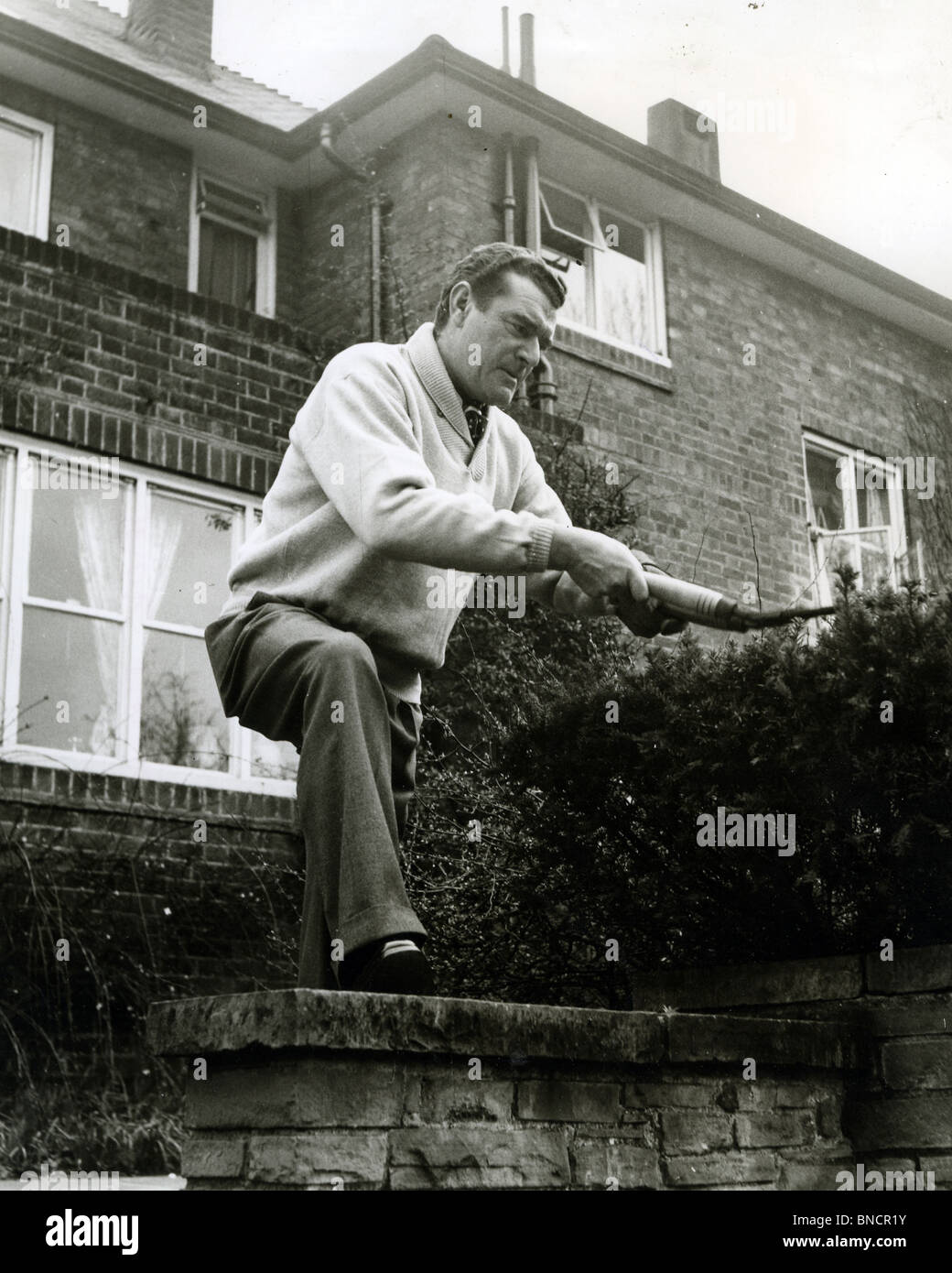 JACK HAWKINS (1910-73) English film actor at his London home in 1954 ...