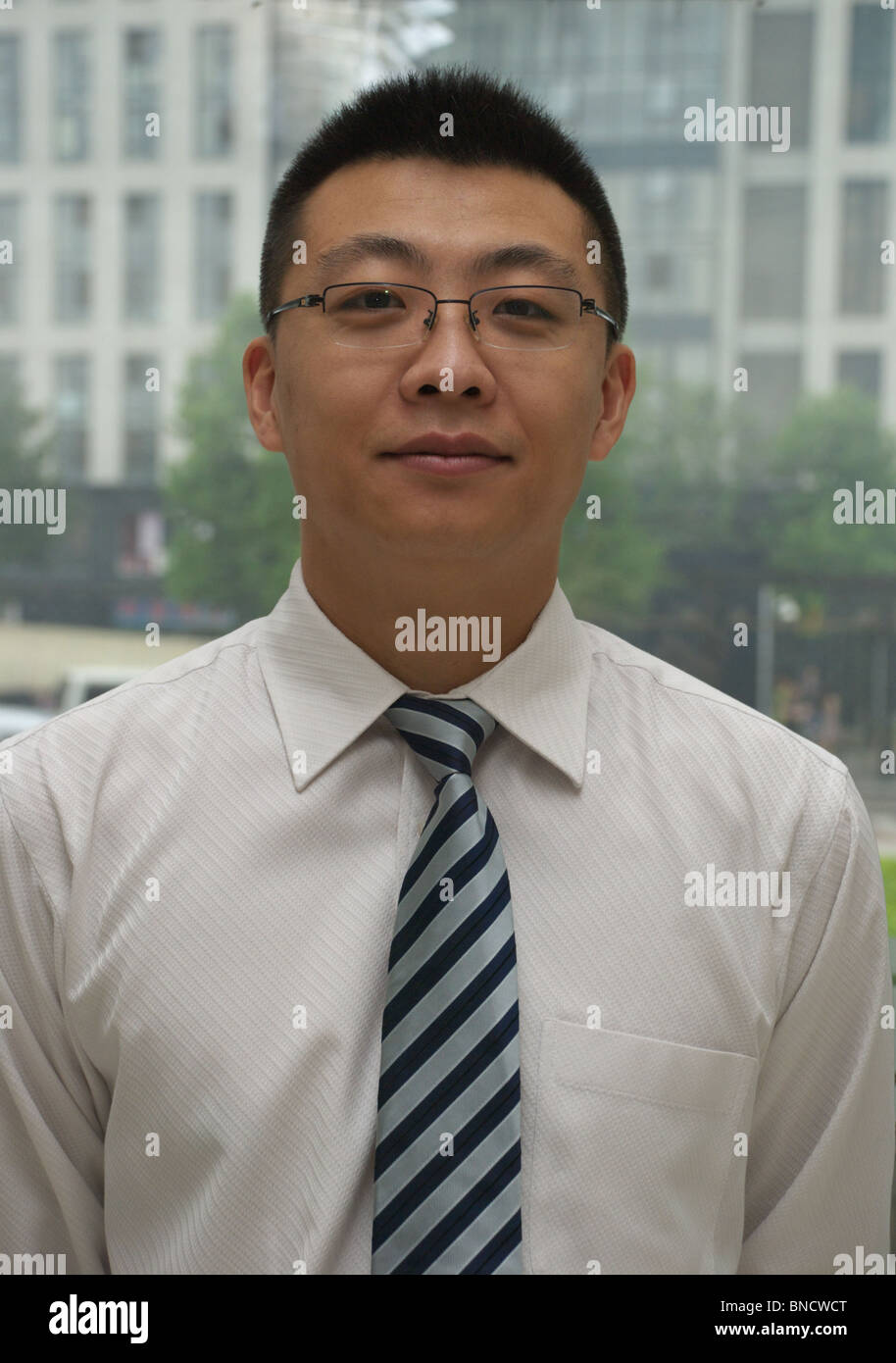 Chinese man in business hi-res stock photography and images - Alamy