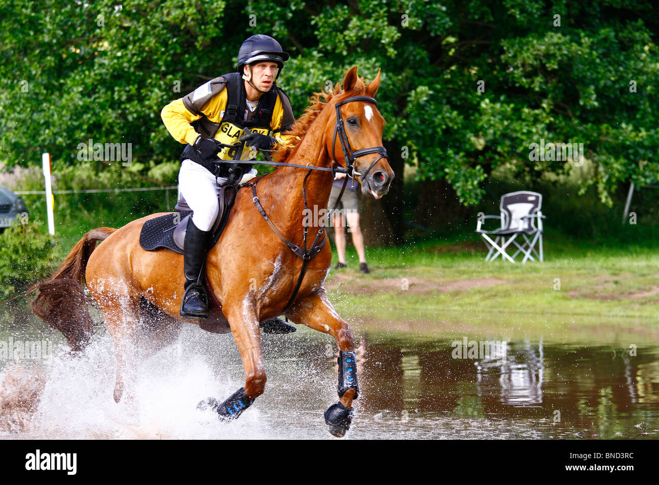 Eventing - Horse and rider galloping through water at Glanusk Horse ...