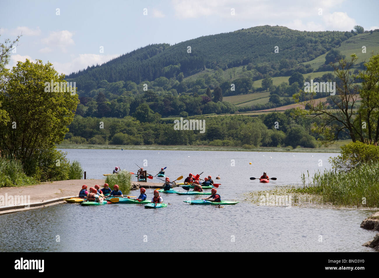 School children canoeing on lake in brecon beacon mountains hi-res ...