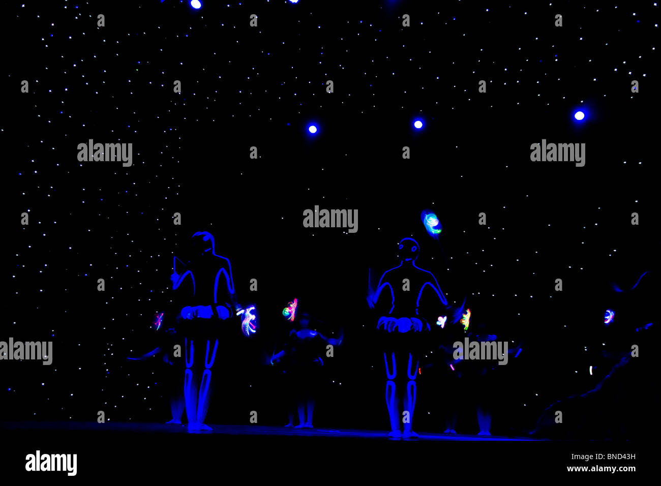 Beautiful light and shadow show with starry sky Stock Photo - Alamy