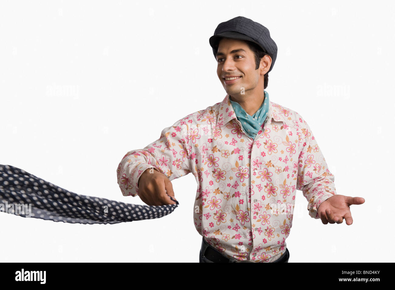 Actor portraying Dev Anand waving scarf Stock Photo - Alamy