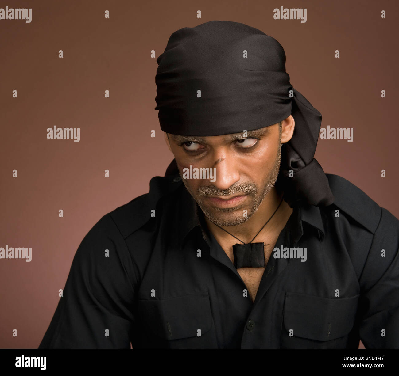 Close-up of an actor portraying a villain Stock Photo - Alamy
