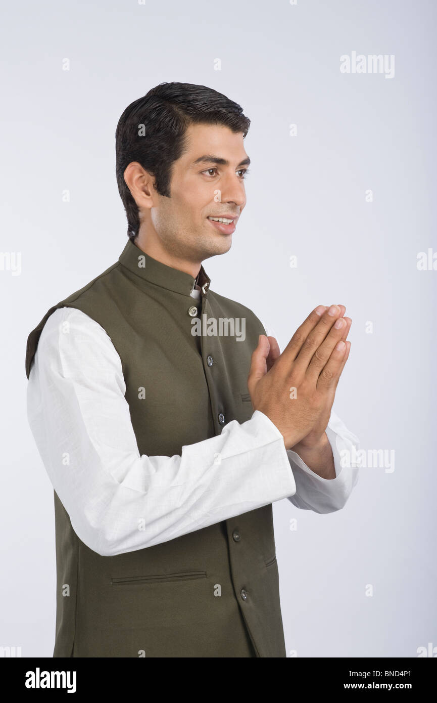 Actor portraying a politician greeting Stock Photo - Alamy