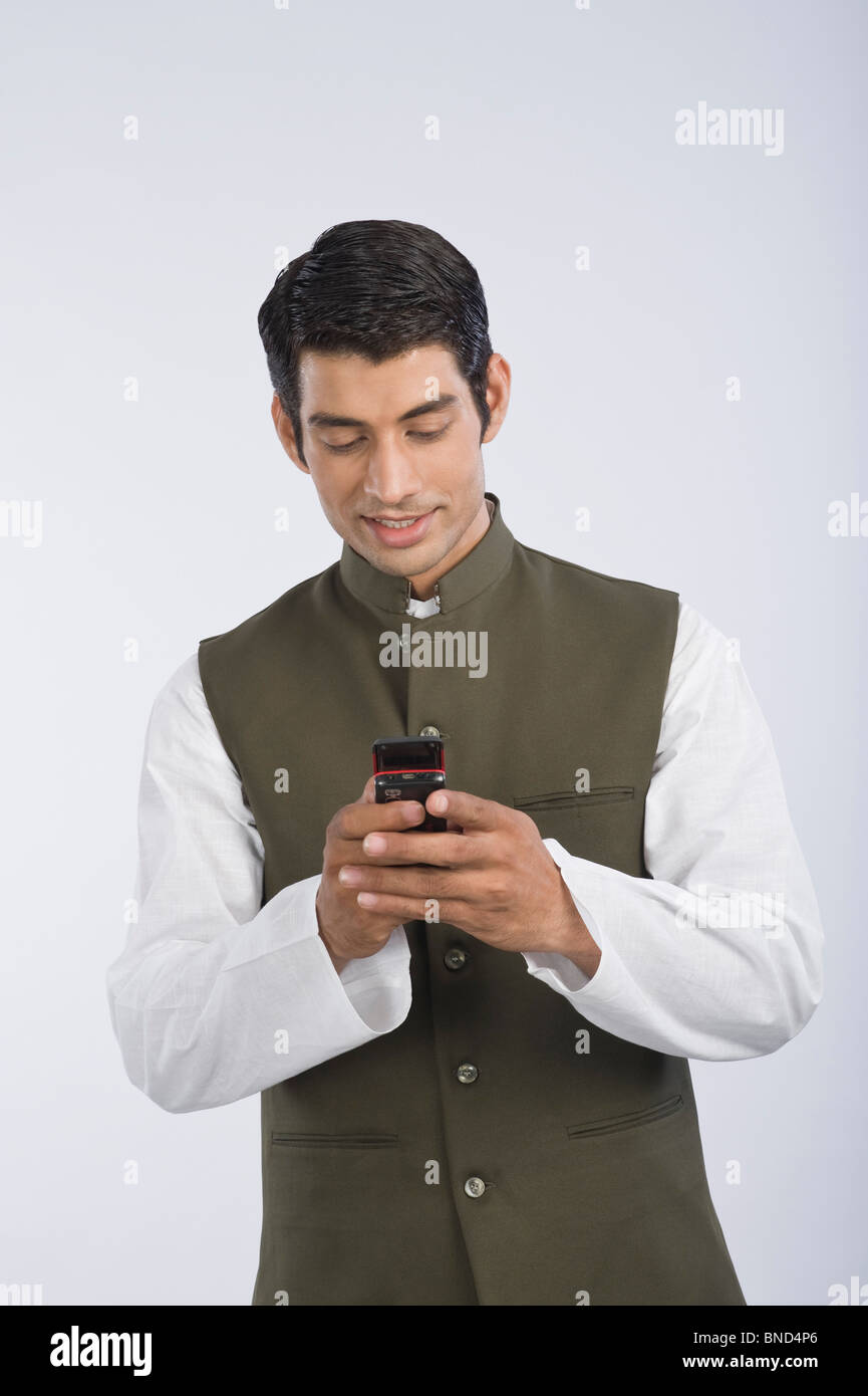 Actor portraying a politician using a mobile phone Stock Photo - Alamy
