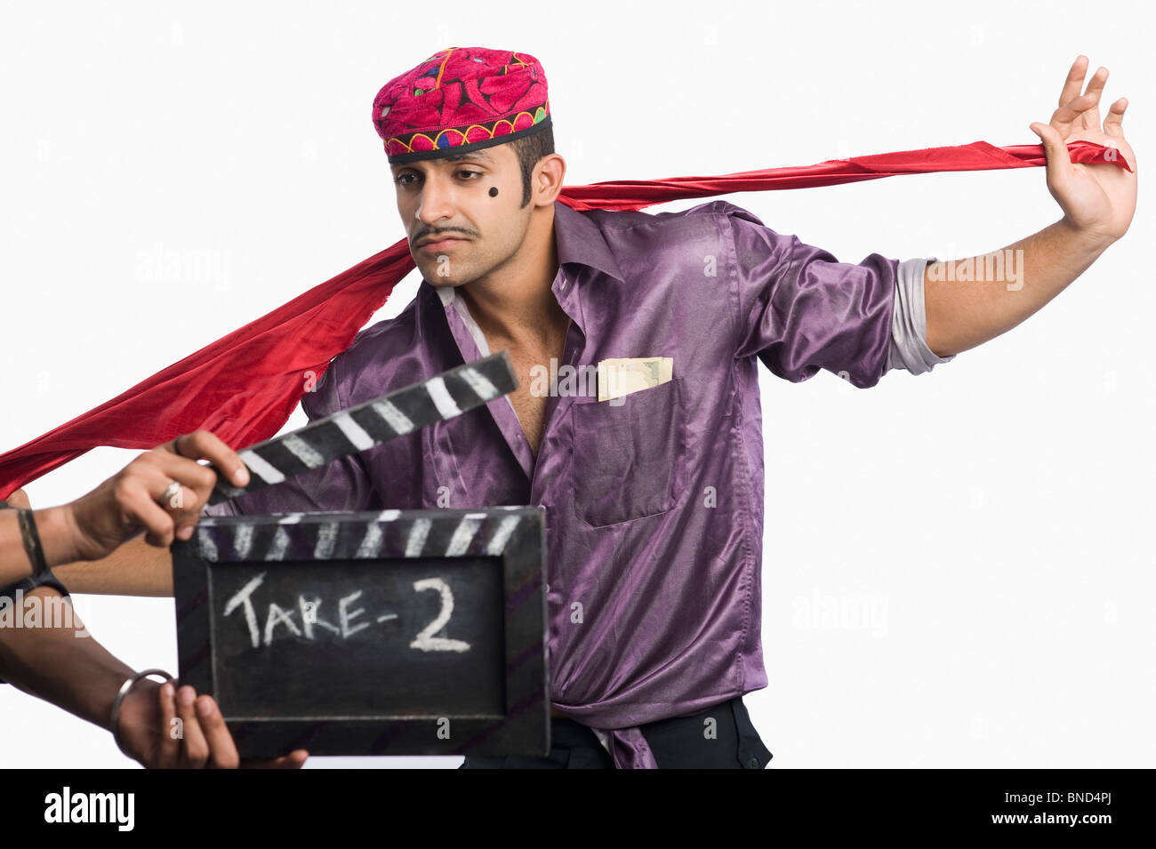 Actor portraying a tapori on a movie set Stock Photo - Alamy