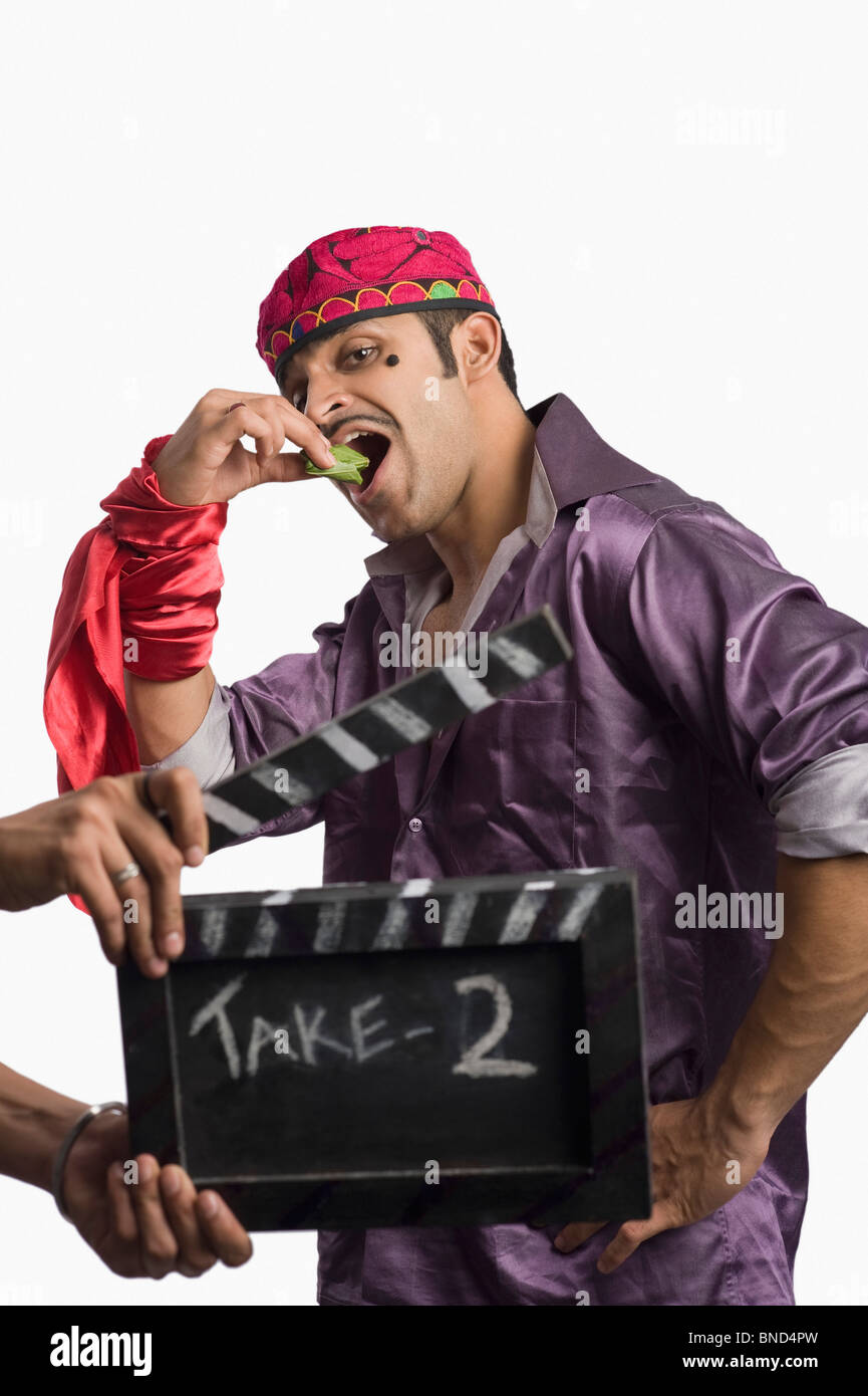 Portrait of an actor portraying a tapori on a movie set Stock Photo - Alamy