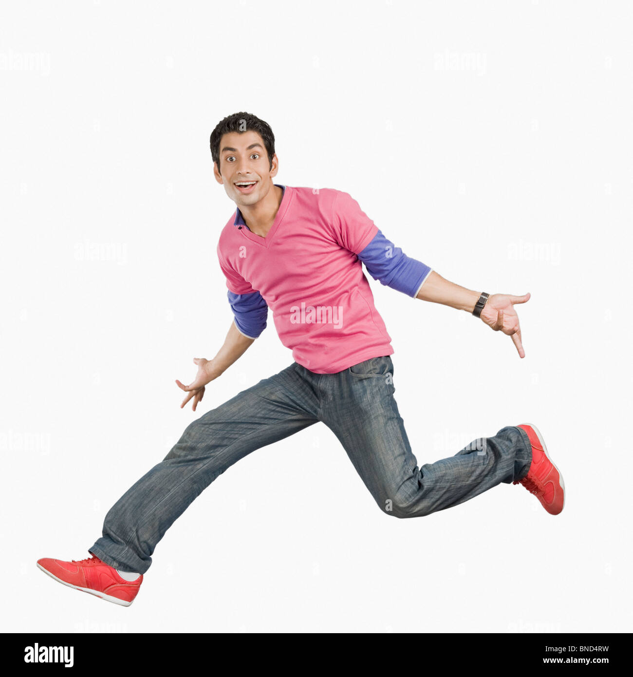 Portrait of an actor jumping Stock Photo - Alamy