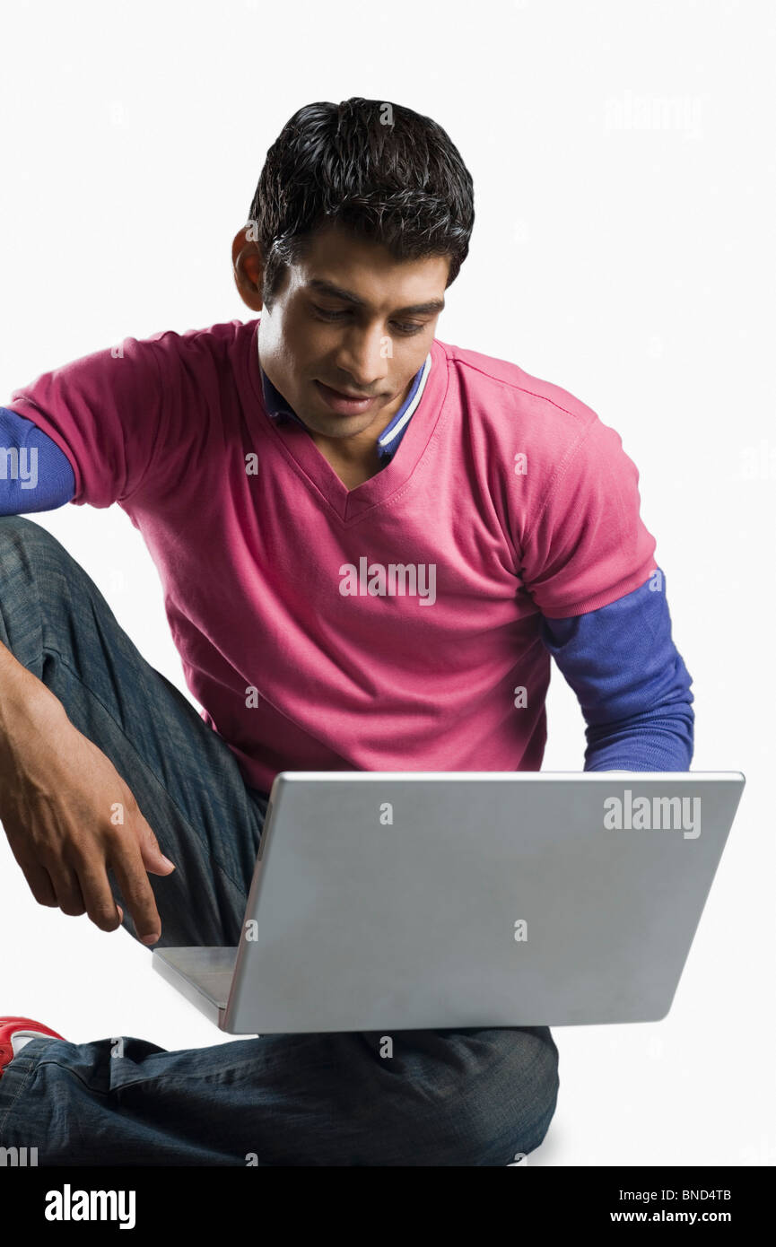 Man using a laptop Stock Photo - Alamy