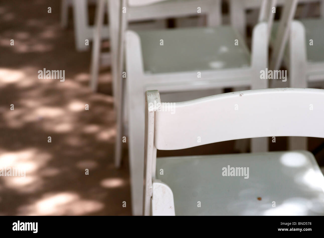 Rows of empty chairs set up for an upcoming wedding ceremony Stock ...