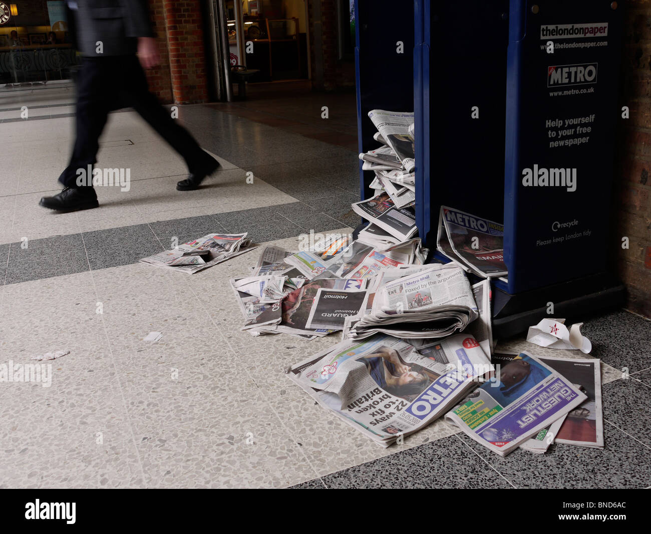 Free London metro newspapers, litter Liverpool Street Station in ...