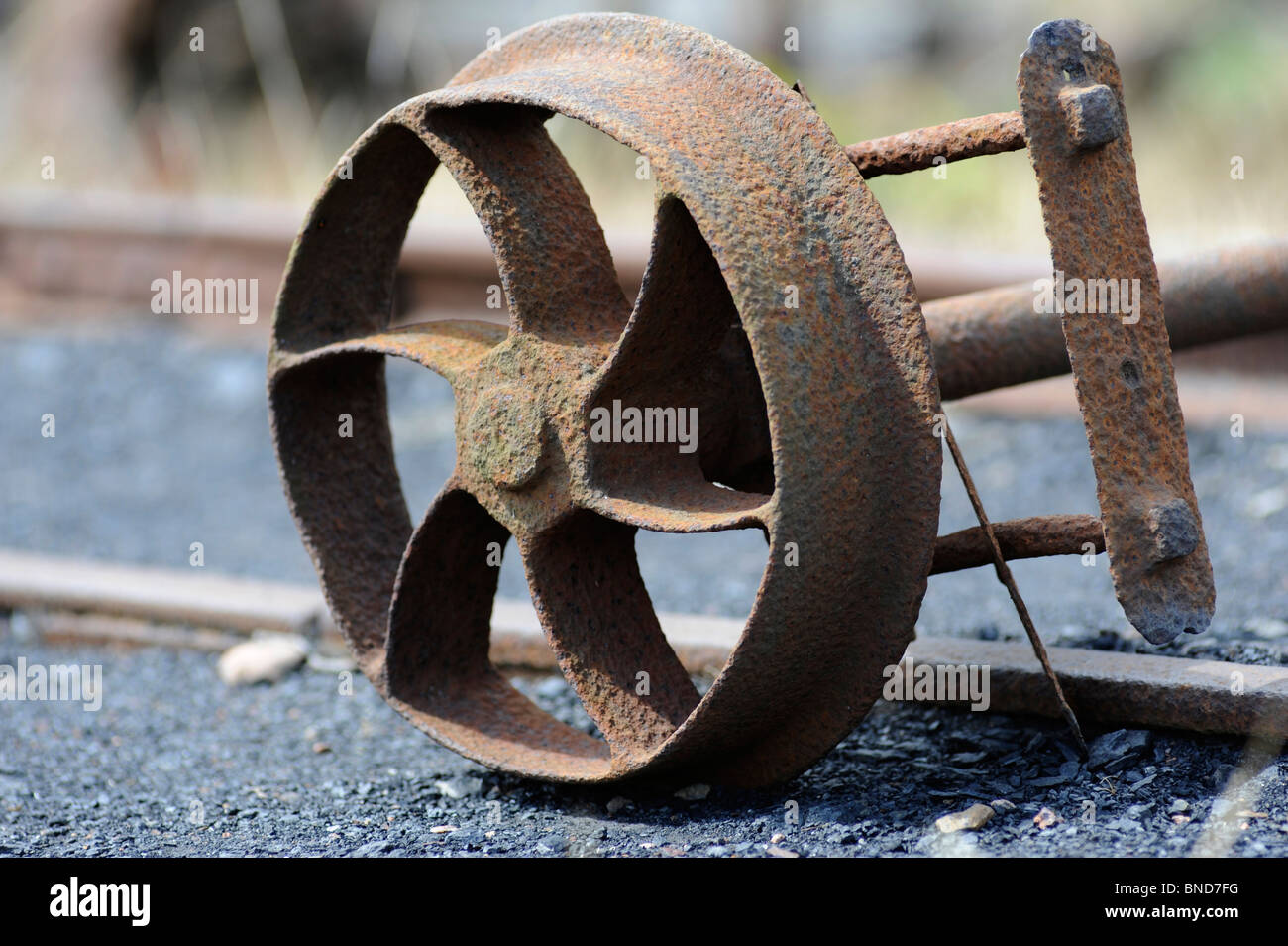 Unused and decaying wheels of a mining cart lie idle from neglect Stock ...