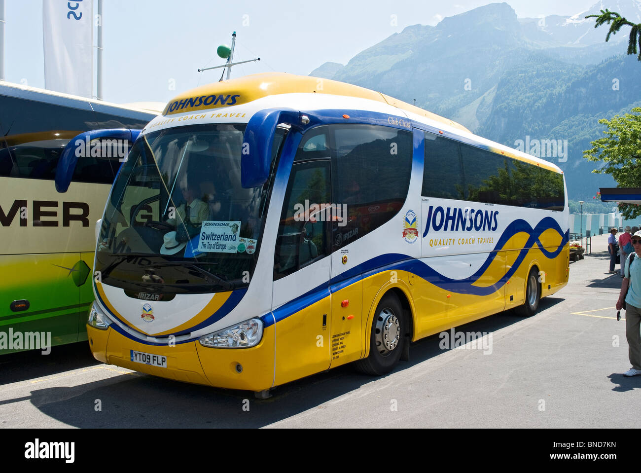 British coach touring Switzerland and Europe Stock Photo - Alamy