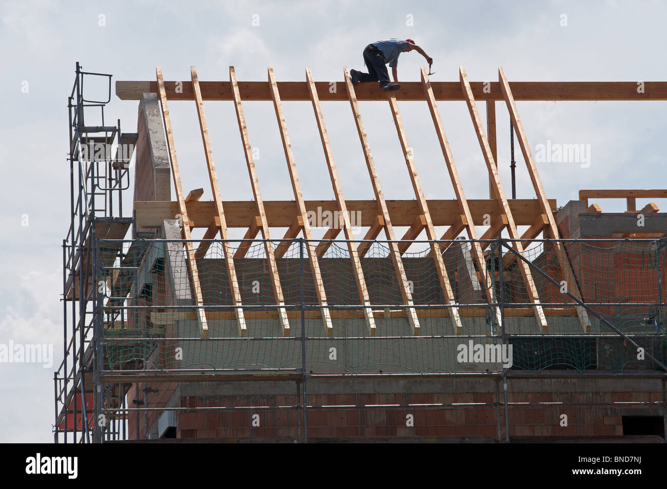 Construction worker building a house in Germany Stock Photo - Alamy