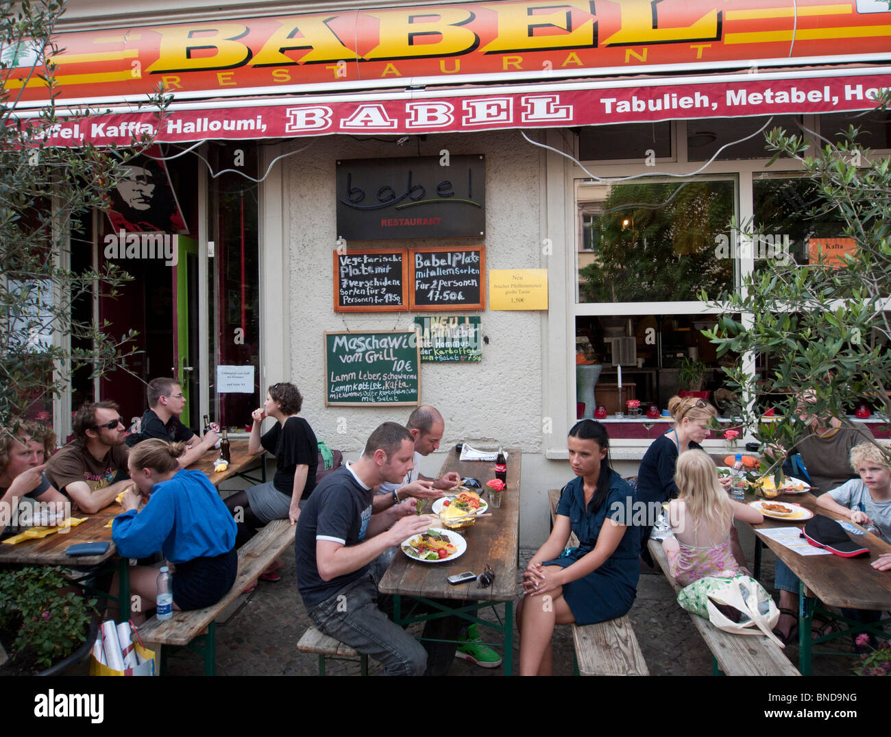 Busy Lebanese restaurant with pavement seating on bohemian ...