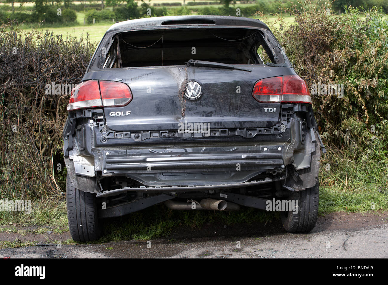 burned out stolen volkswagen golf car crashed into a ditch in northern ...