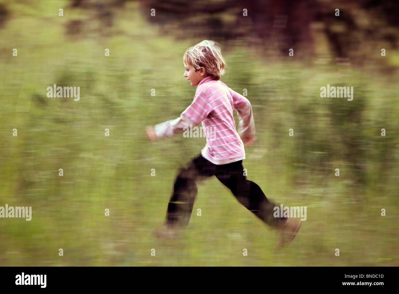 A boy running hi-res stock photography and images - Alamy