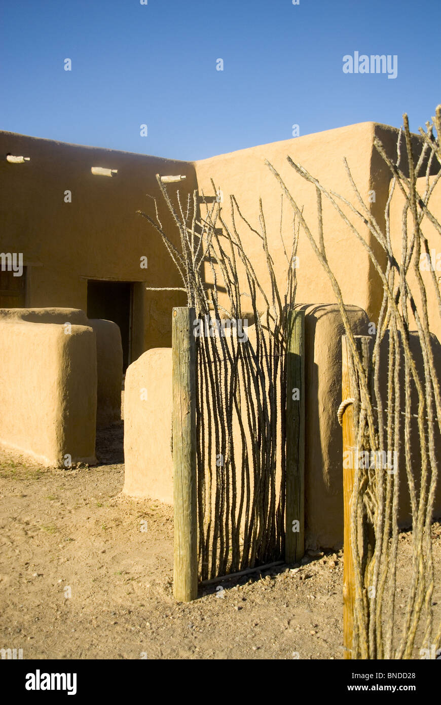 Adobe Building and Fence Stock Photo - Alamy