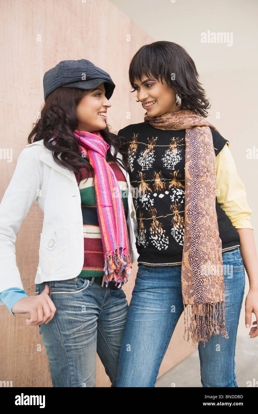 Two women smiling together Stock Photo - Alamy