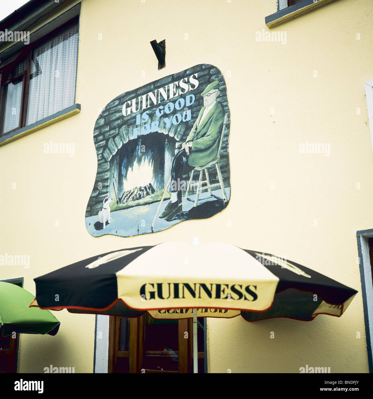 Guinness sign and parasol, pub entrance, Leenane, Connemara, County ...