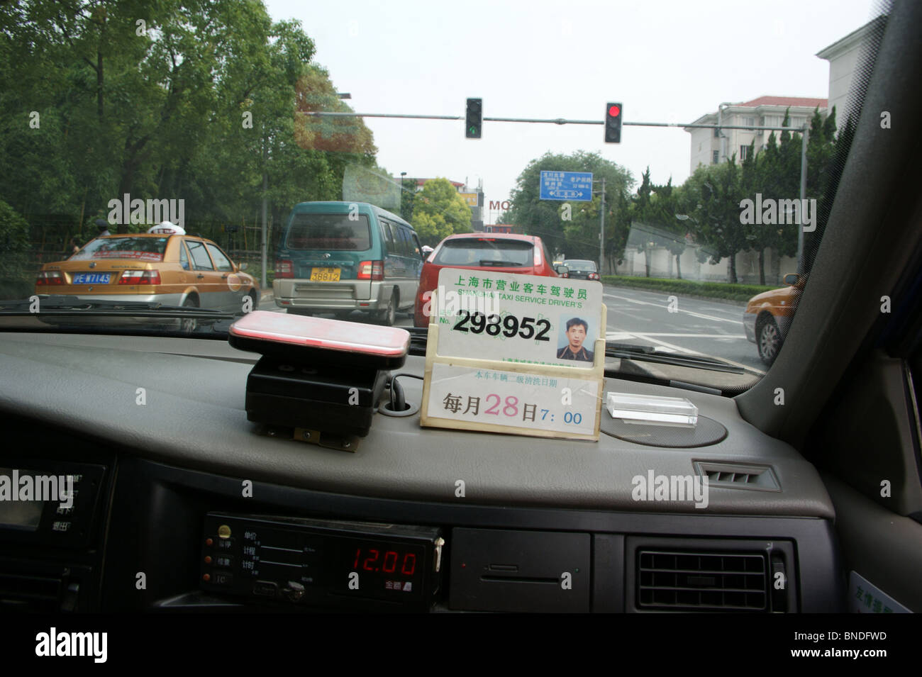 Taxi driver's ID, in Shanghai, China Stock Photo - Alamy