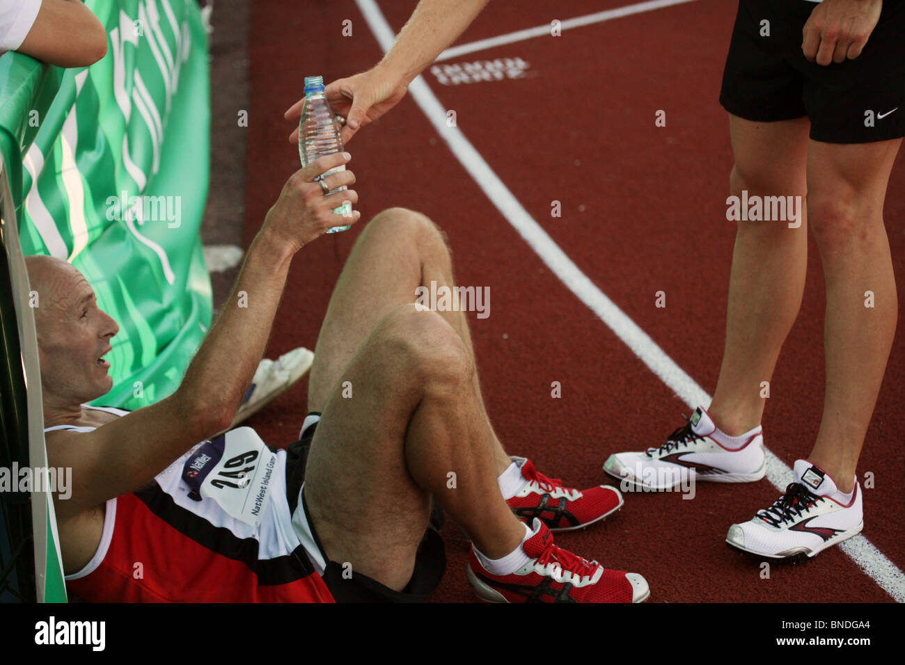 David ibbotson exhausted runner ninth hi-res stock photography and ...