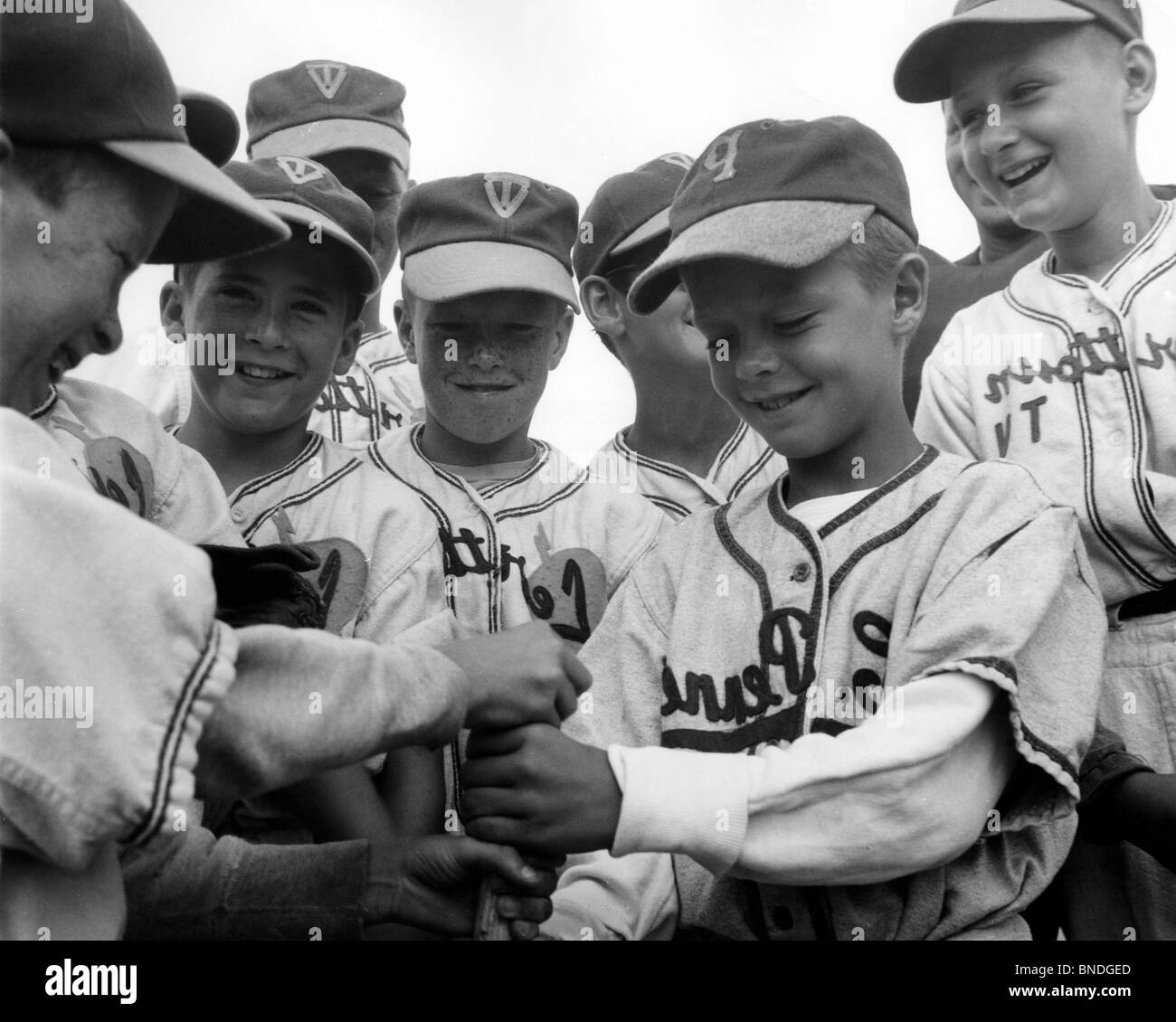 Team holding Black and White Stock Photos & Images - Alamy