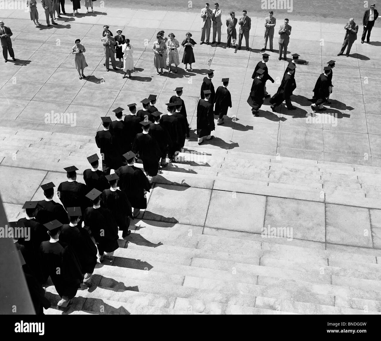 High angle view of graduates walking in a row Stock Photo - Alamy