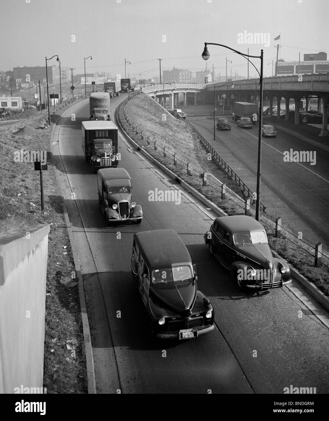 Car on road cityscape Black and White Stock Photos & Images - Alamy