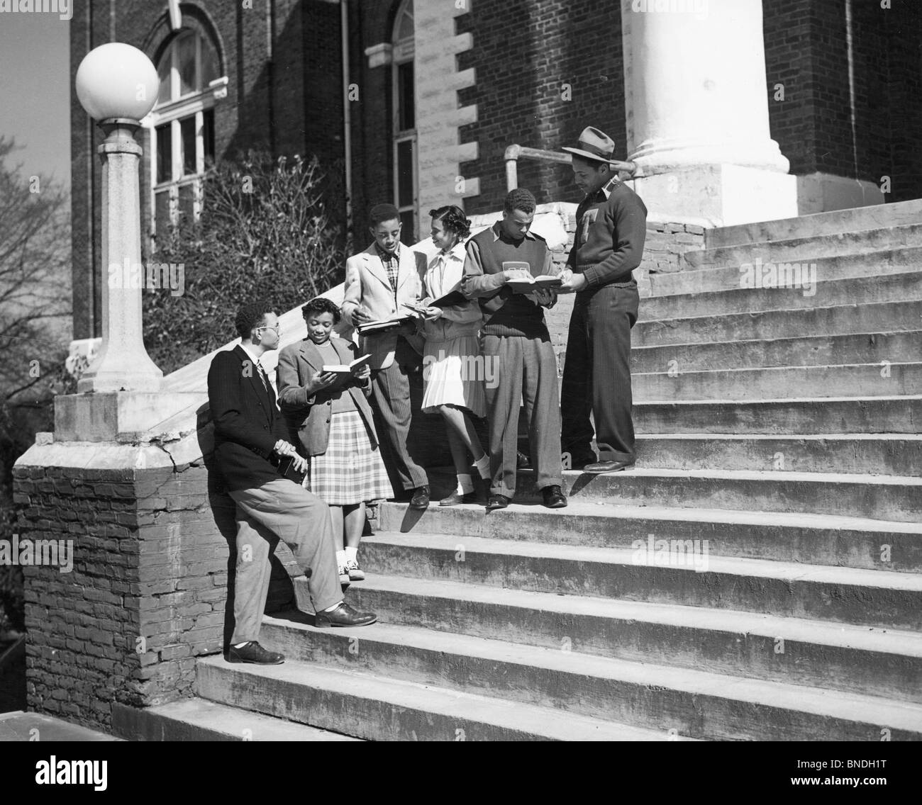 Children school sit in Black and White Stock Photos & Images - Alamy