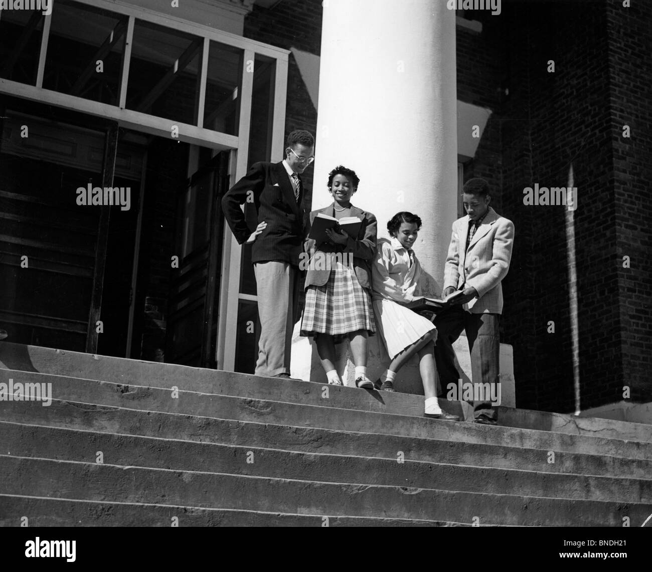 Two women stand on Black and White Stock Photos & Images - Alamy