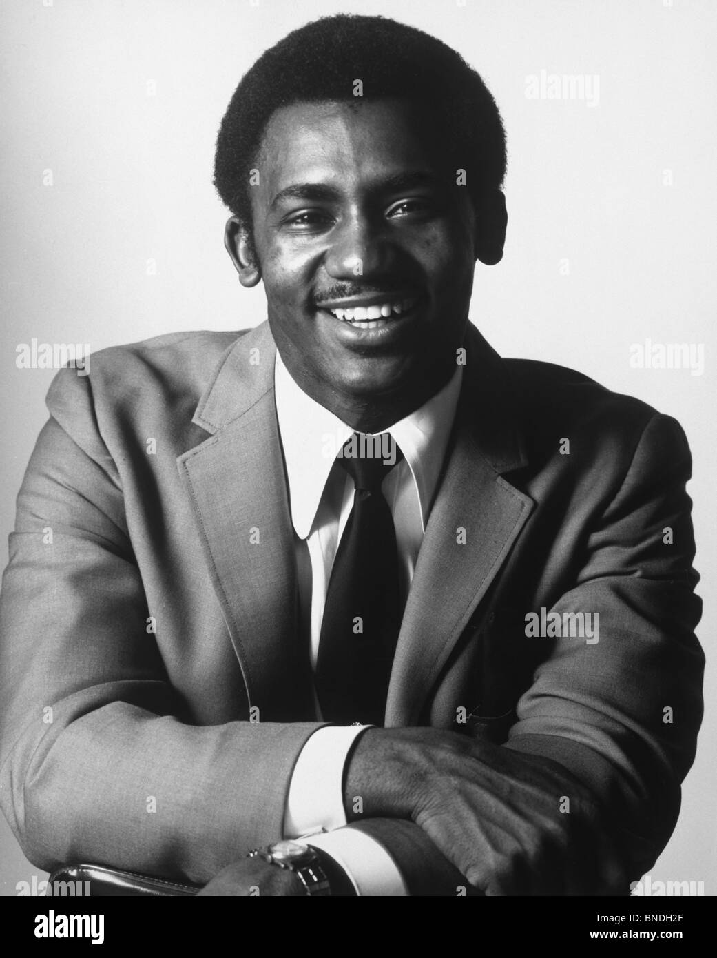 Portrait of a businessman smiling Stock Photo - Alamy