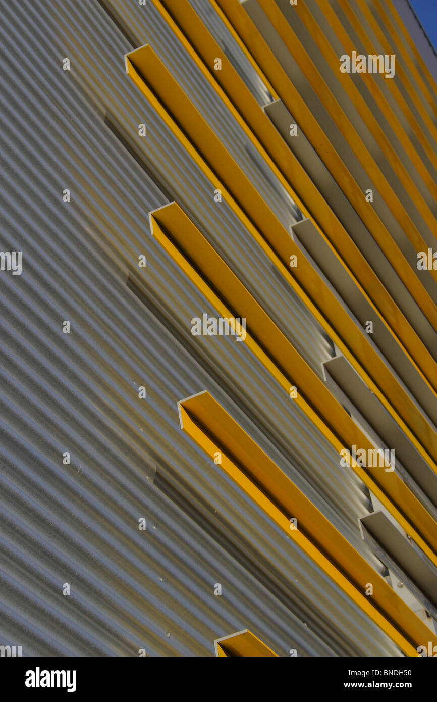 metal siding architecture orange blue silver vertical Stock Photo - Alamy