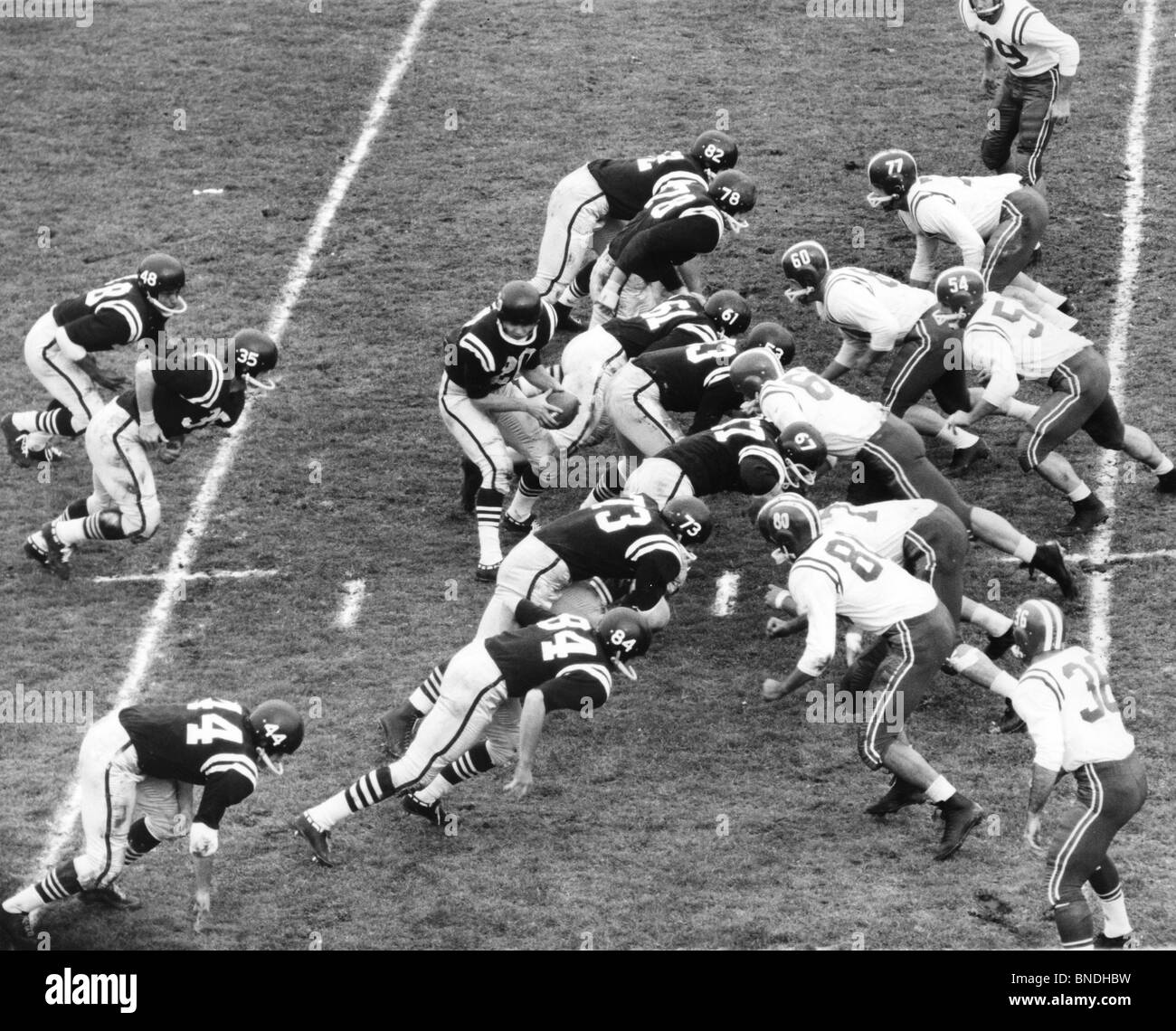 High angle view of football players playing football Stock Photo - Alamy