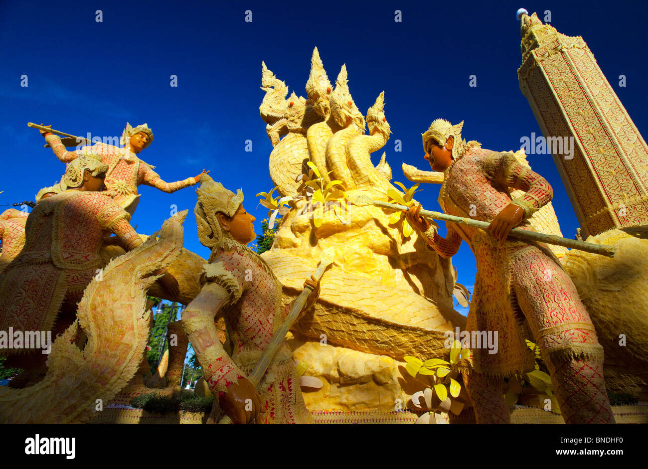 Giant candle sculpture depicting Buddhist scenes Candle Festival Ubon ...