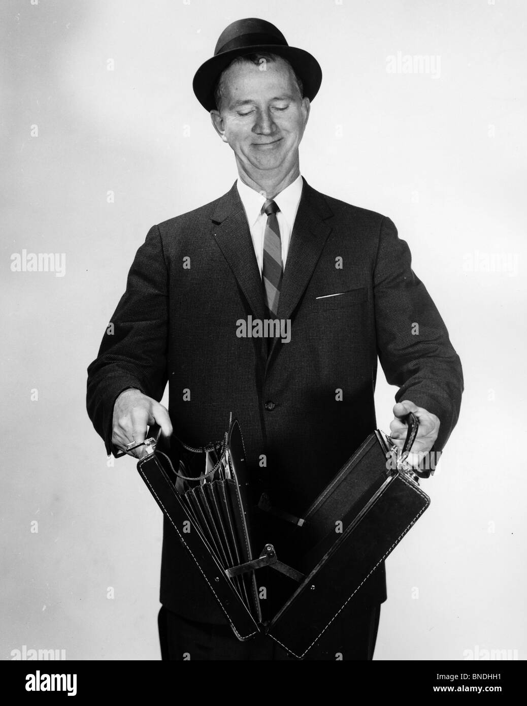 Close-up of a businessman opening a briefcase Stock Photo - Alamy