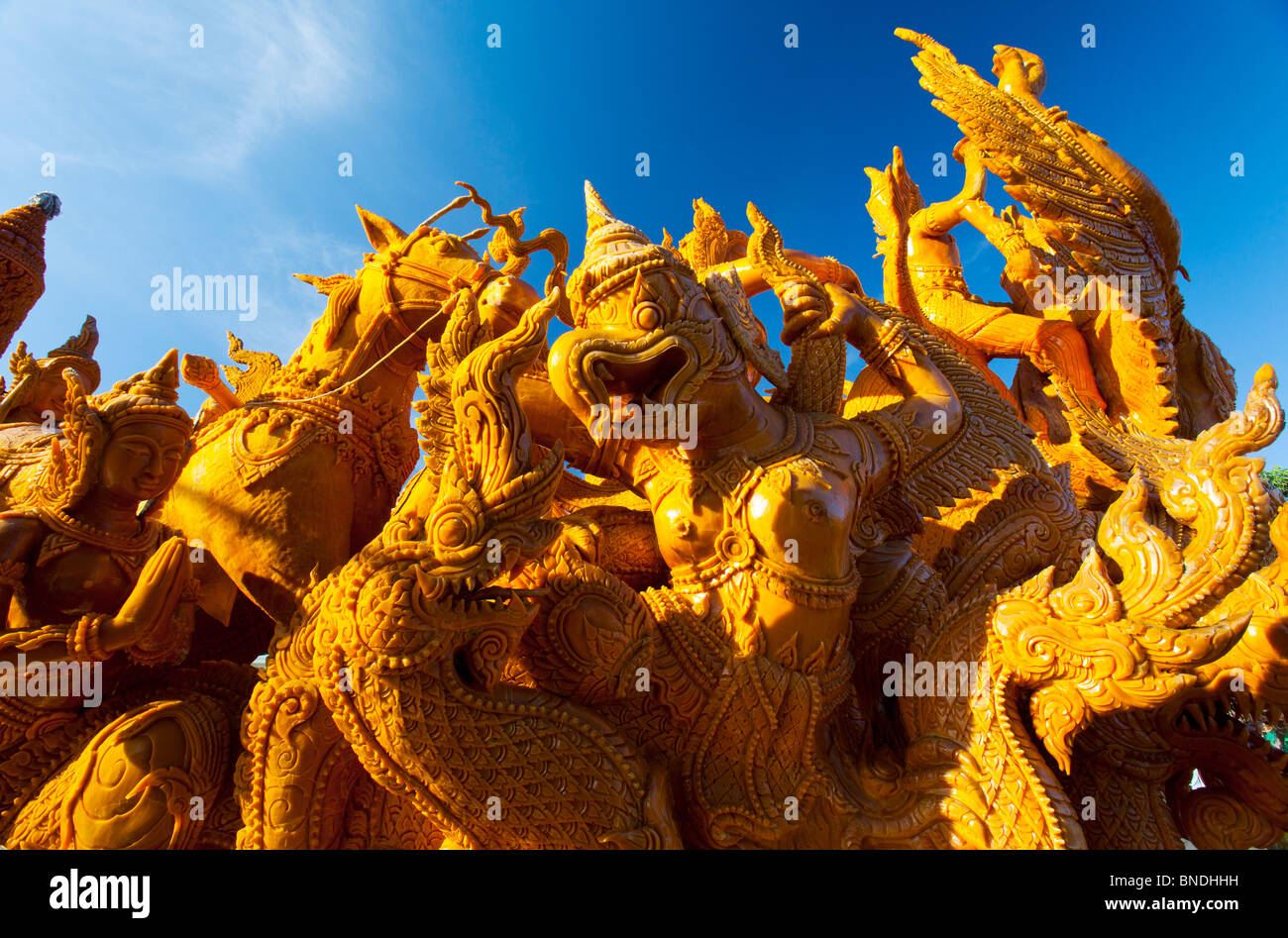 Giant candle sculpture depicting Buddhist scenes Candle Festival Ubon ...