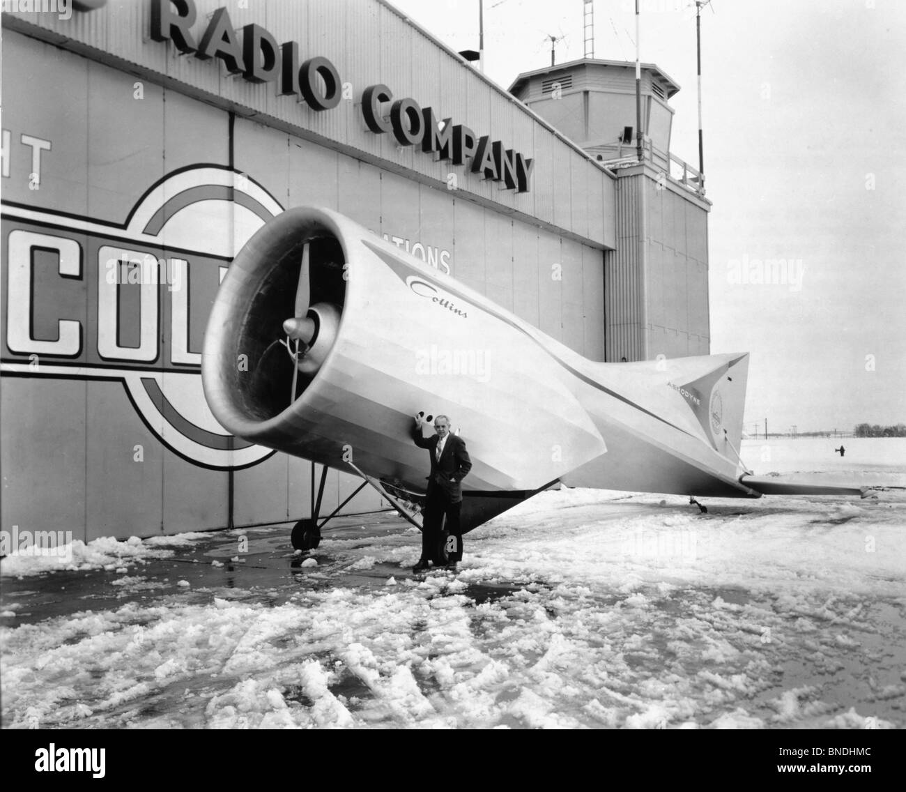 Man standing near an aircraft, Collins Aerodyne Stock Photo - Alamy