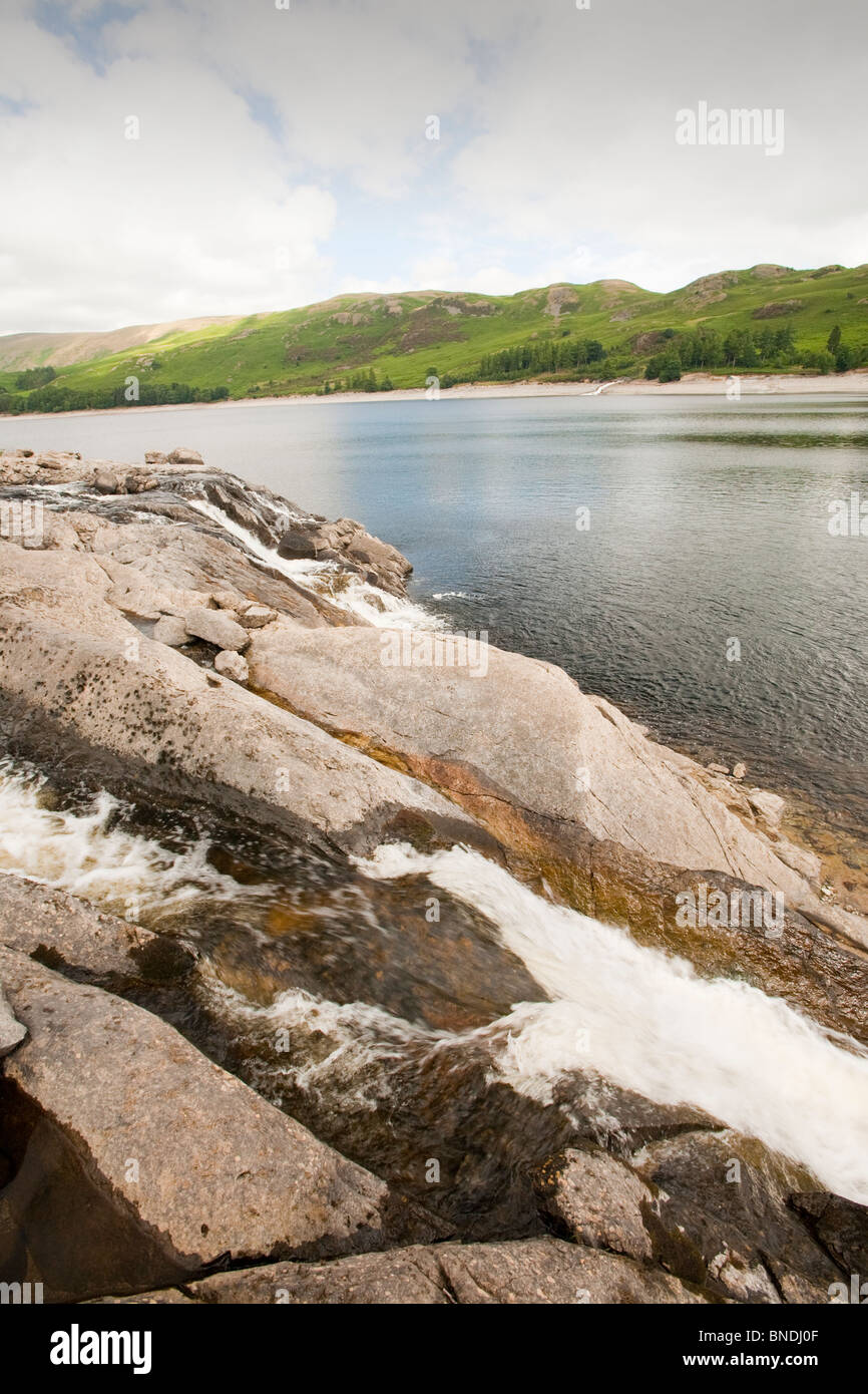 Water tumbling over rock that is normally 20 feet under water at ...