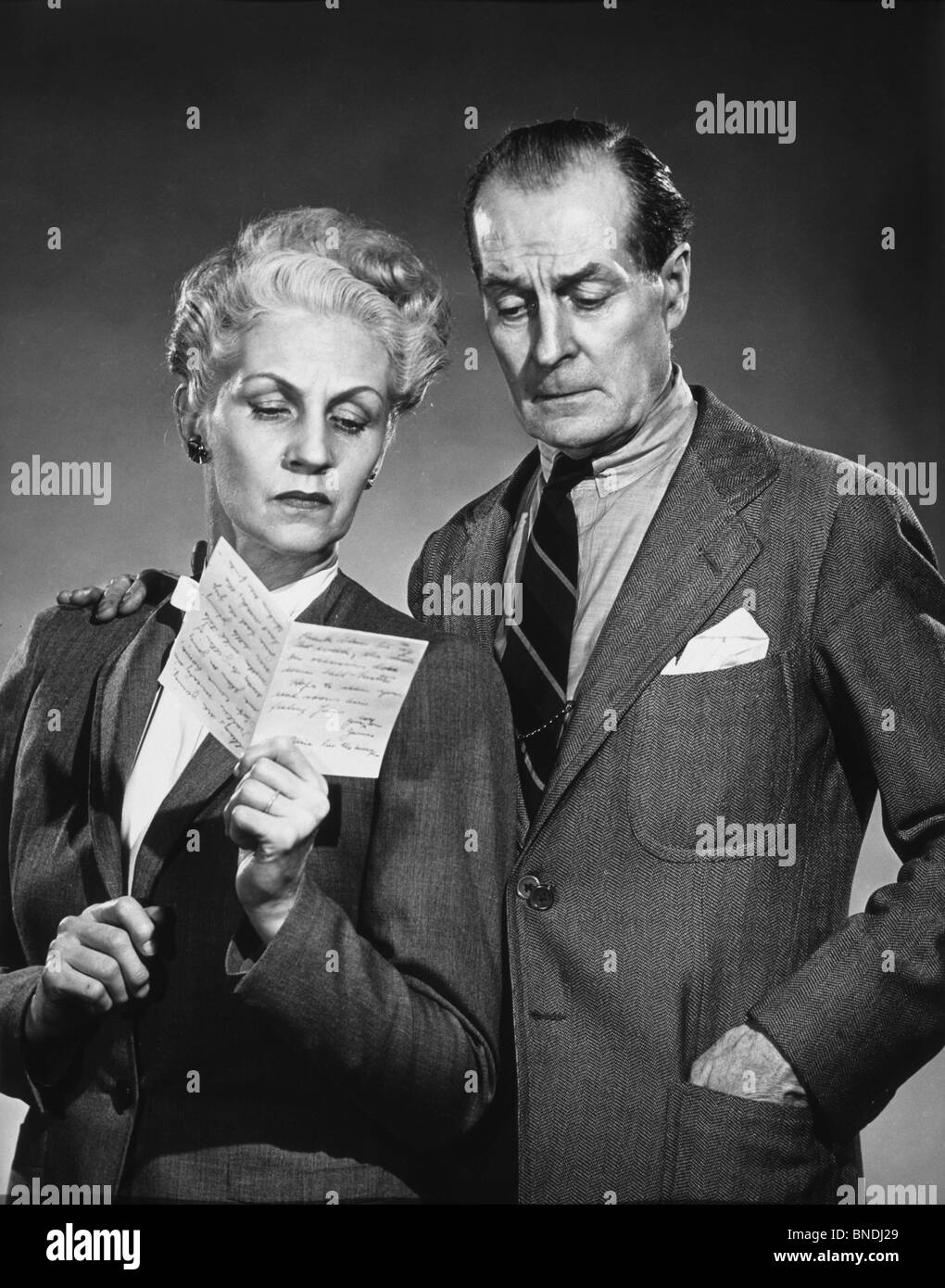 Woman reading letter serious Black and White Stock Photos & Images - Alamy