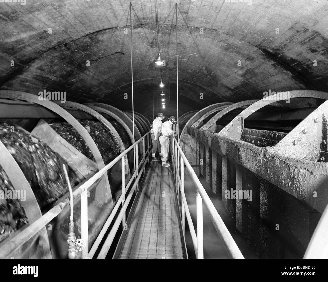 USA, Pennsylvania, Robena Mine, Two workers standing in coal mine Stock ...
