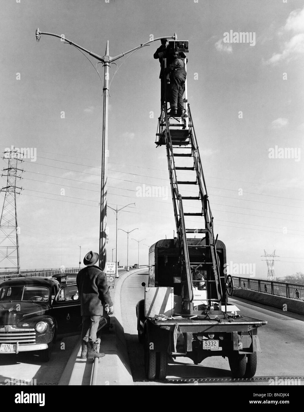 Two people looking street Black and White Stock Photos & Images - Alamy
