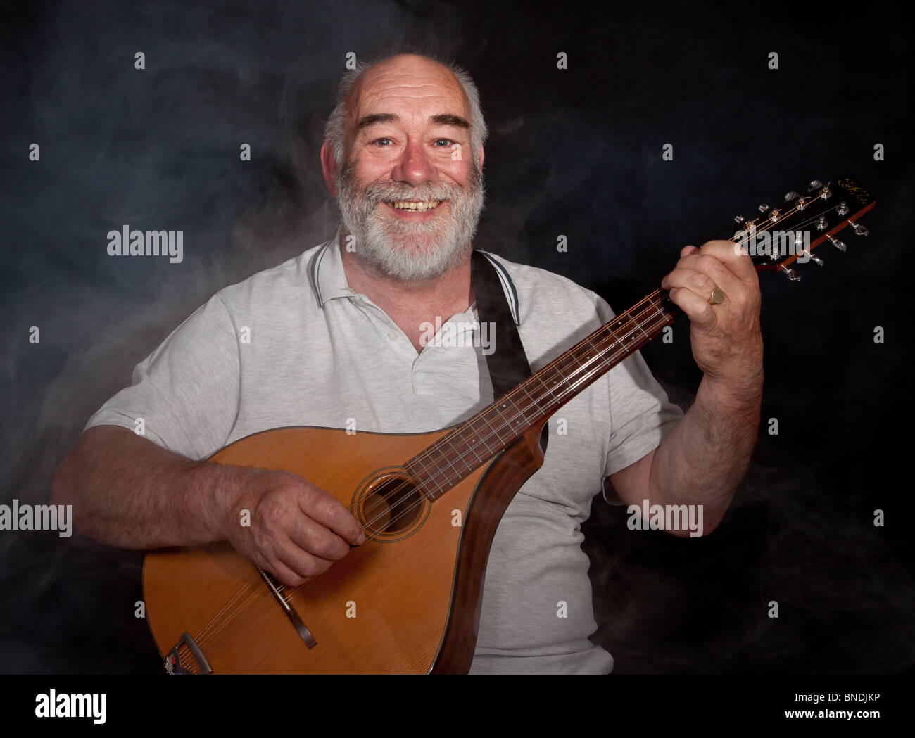 Man playing bouzouki hi-res stock photography and images - Alamy