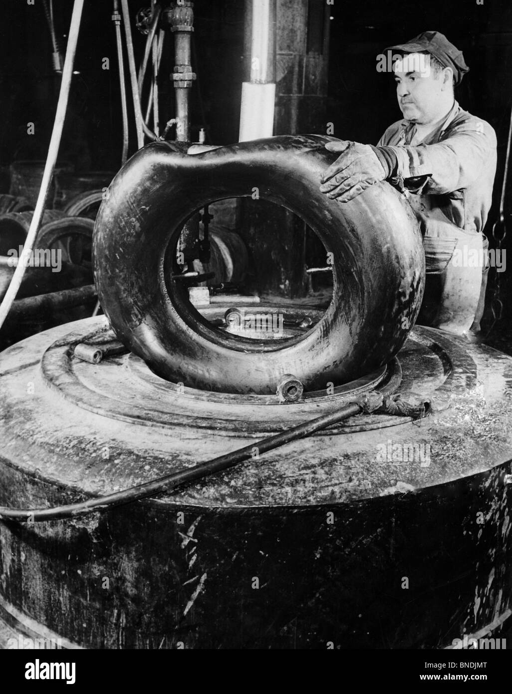 Worker in black protective Black and White Stock Photos & Images - Alamy