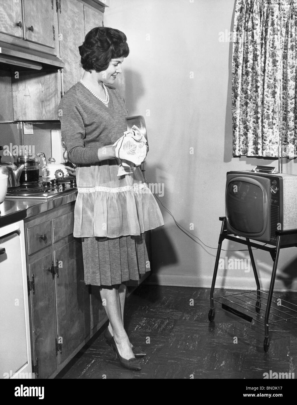 Watching television side view vintage hi-res stock photography and ...
