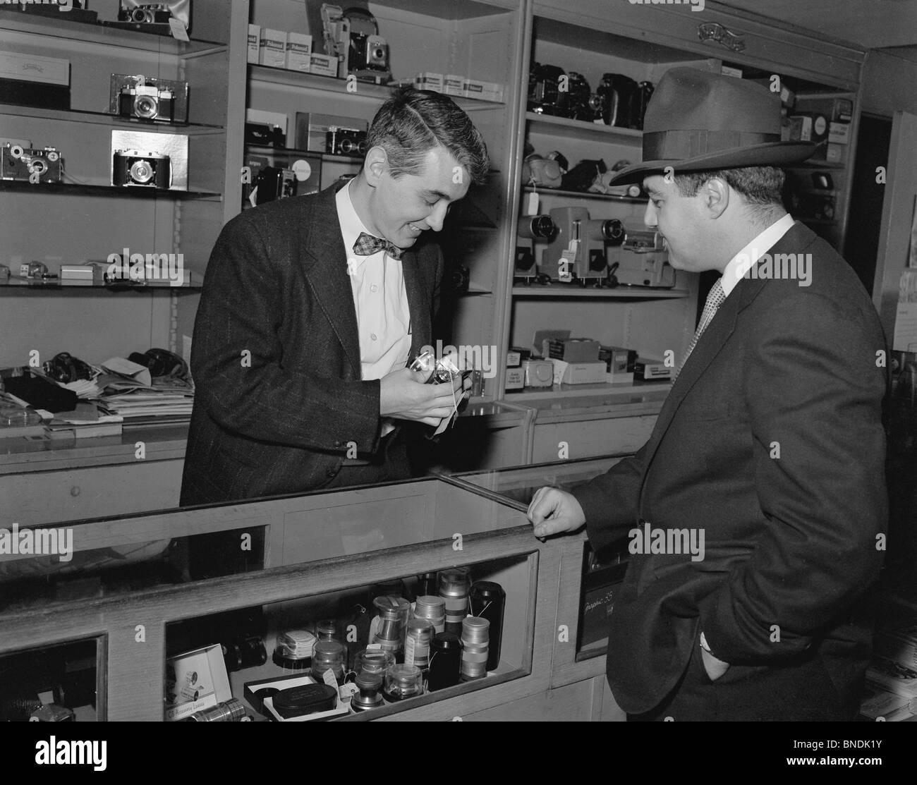Salesman showing hat hi-res stock photography and images - Alamy