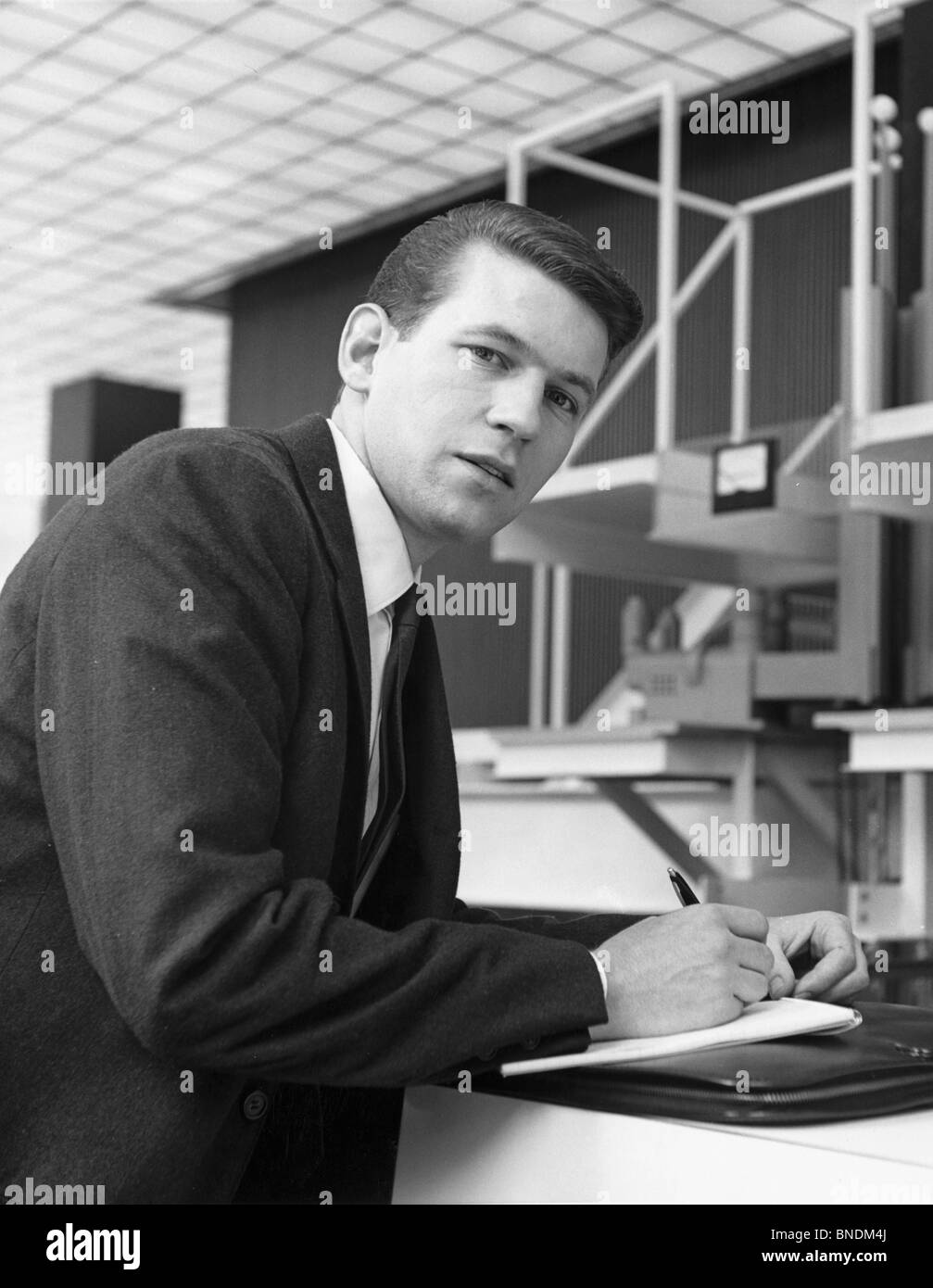 Two men standing well Black and White Stock Photos & Images - Alamy