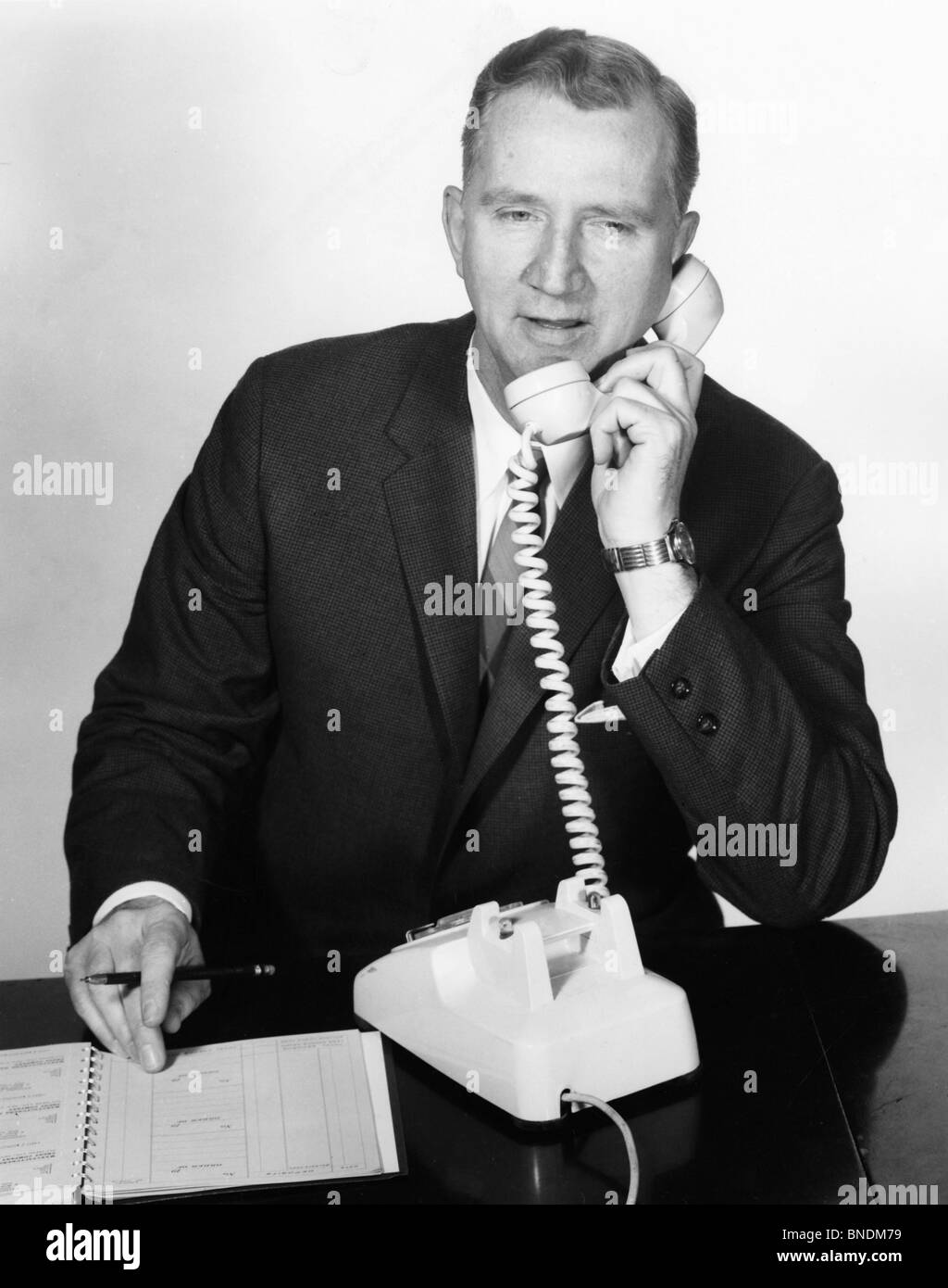 Close-up of a businessman using a telephone Stock Photo - Alamy