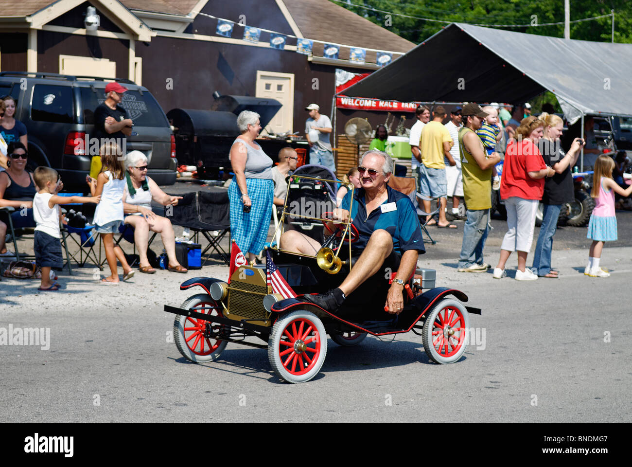 Man in Little Car in the Oldest Continuous Independence Day Parade in ...